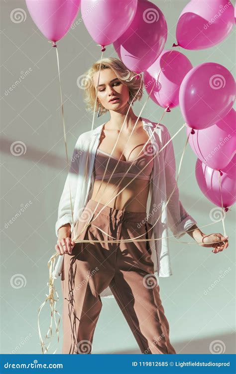 Beautiful Seductive Young Woman In Fashionable Clothes And Bra Posing