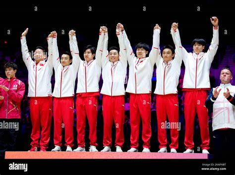 China Celebrate With Their Medals After Winning The Team Gold Medal