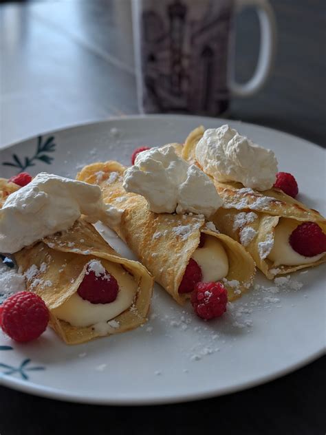 [homemade] Crepes With Raspberry Cream Cheese Filling Fresh Whipped Cream R Food