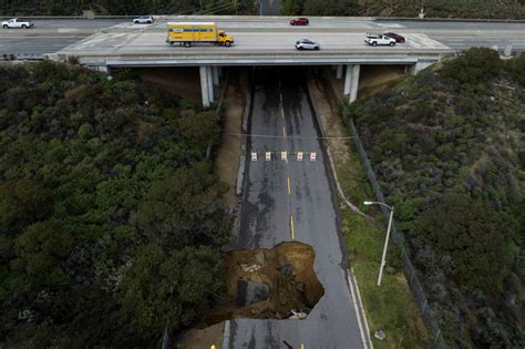 2 Rescued After Car Swallowed By Massive California Sinkhole