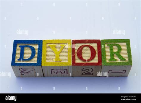 The Term Dyor Visually Displayed On A Clear Background With Copy Space