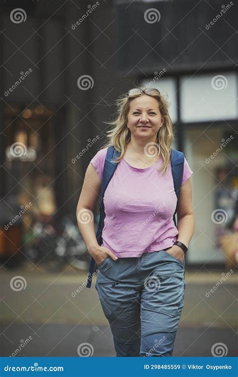 Beautiful Woman Walking Around The City In The Netherlands Stock Image