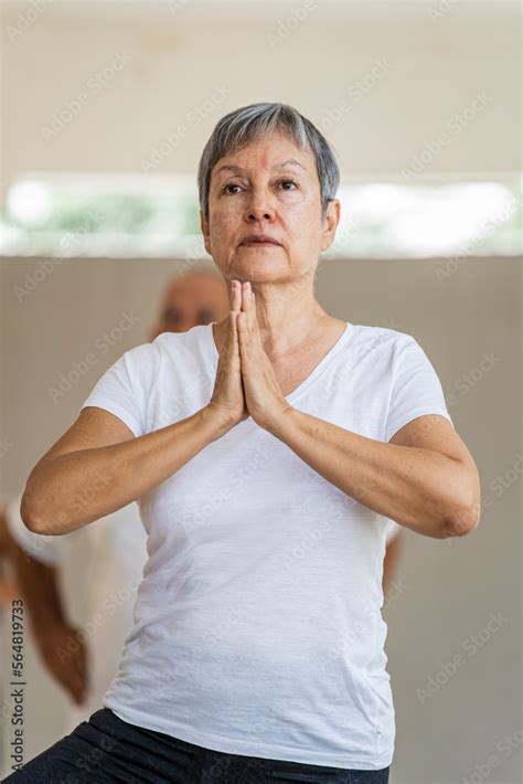 Standing Babe Performing Mudras In Yoga Class Stock Photo Adobe Stock