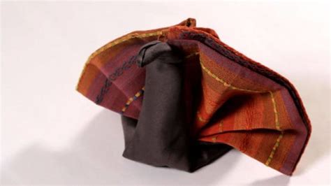 How To Fold A Napkin Into A Pinwheel Howcast