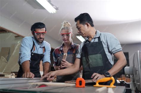 Premium Photo Carpenters Assembling Furniture Small Business In Wood