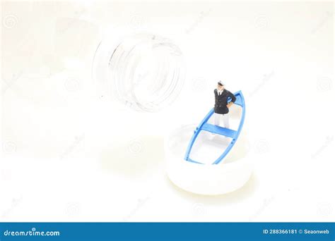 A Small Boat With The Tiny Figure Captain Stock Image Image Of Boat