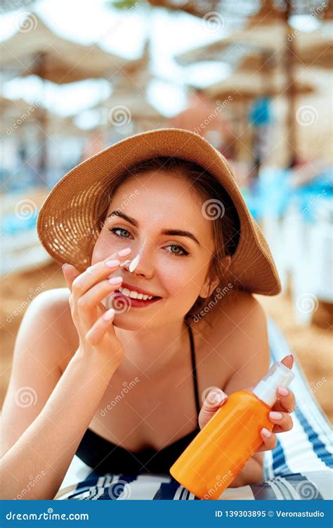 Sunscreen Sunblock Woman Putting Solar Cream On Nose Smiling Beautiful