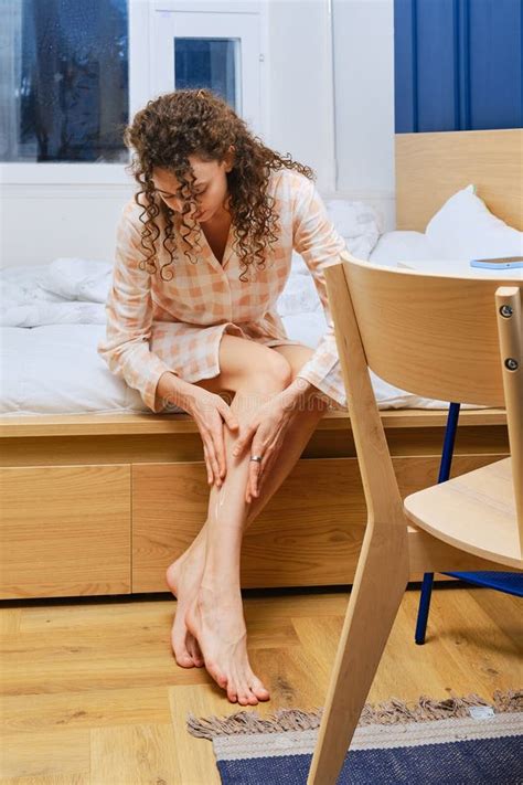 Young Woman Rubbing Nourishing Body Lotion Softening Skin After