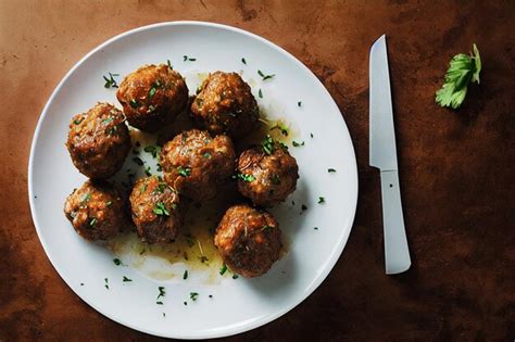 Premium Photo Vertical Shot Of Delicious Meatballs With Tasty Sauces