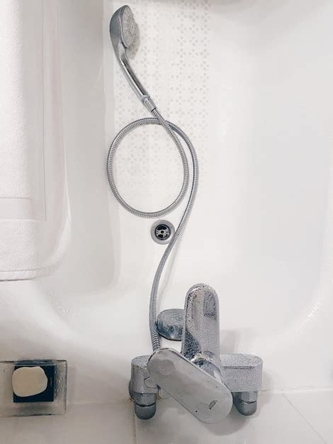 Premium Photo Bathtub From Above Shower And Metallic Cord After