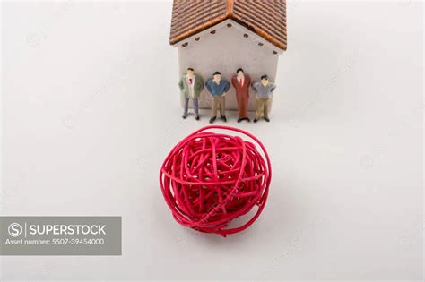 Tiny Figurine Of Man Model In View SuperStock