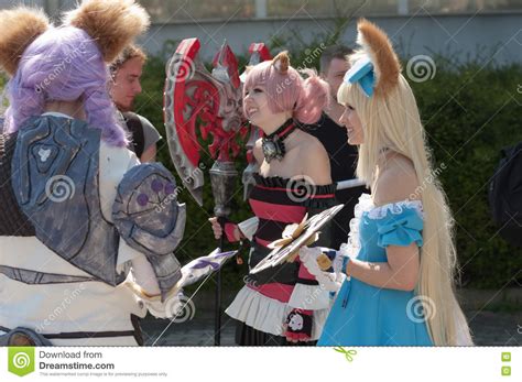 Three Cosplayers Dressed As The Character Elin From Game Tera Online Editorial Stock Image