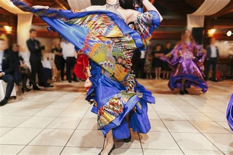 Premium Photo Beautiful Gypsy Girls Dancing In Traditional Blue