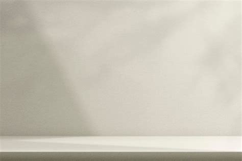 빈 공간이 있는 베이지색 제품 배경 무료 사진