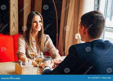 Young Happy Couple Romantic Date Drink Glass Of White Wine At
