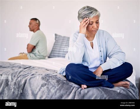Angry Divorce And A Senior Couple In The Bedroom For A Fight Sad And