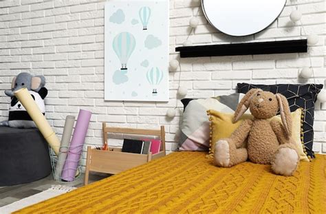 Premium Photo Cute Toy Bunny On Bed With Orange Blanket Bedroom Interior