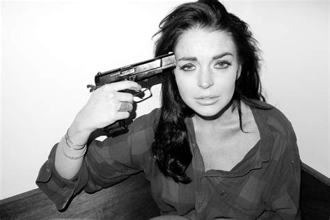 Lindsay Lohan Poses With A Disturbing Prop