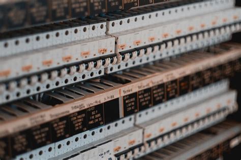 Premium Photo Electrical Switchboard Set Of Electrical Fuses Circuit Breakers Close Up