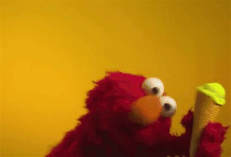 Elmo Holding Ice Cream 
