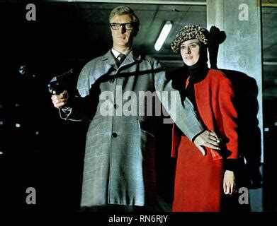 THE IPCRESS FILE MICHAEL CAINE AS HARRY PALMER SUE LLOYD AS JEAN COURTNEY Date Stock