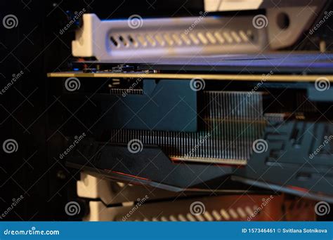 Computer Circuit Board And Cpu Cooling Fans Illuminated By Internal