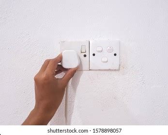 Putting Switch Plug Into Electric Socket Stock Photo 1578898057 Shutterstock