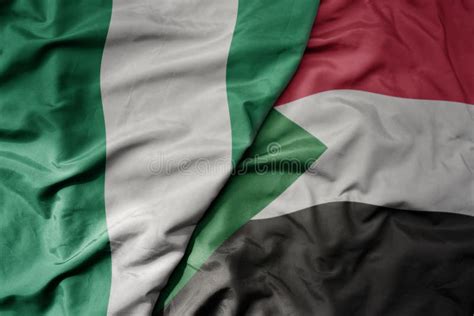 Big Waving National Colorful Flag Of Nigeria And National Flag Of Sudan