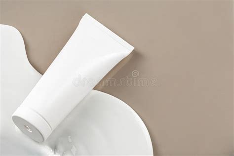 Blank White Skincare Product Tube On Beige Background Stock Image