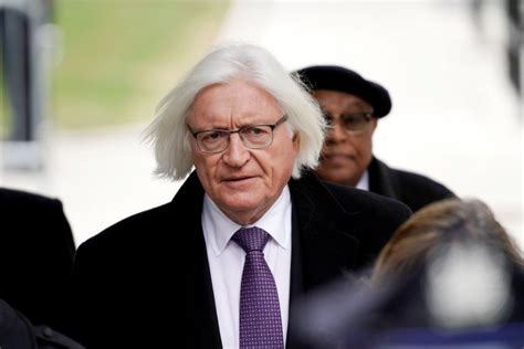 Topless Protester Charges At Bill Cosby Outside Courthouse Before Actor