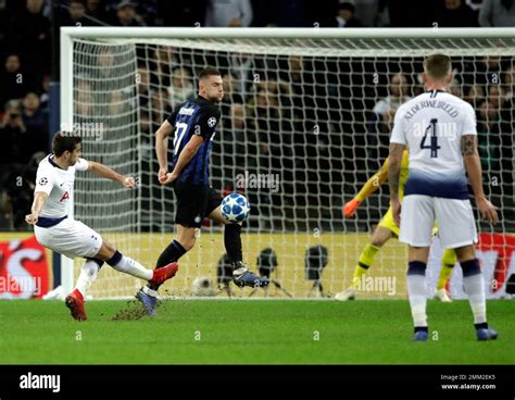 Tottenham Midfielder Harry Winks Left Tries To Score During A
