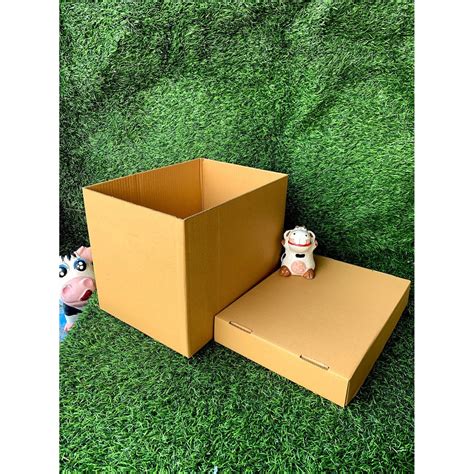 กล่องกระดาษมีฝาปิด ขนาด A4 กระดาษลูกฟูกสีน้ำตาล แถมฟรี เทปกาวติดก้นกล่องทุกกล่องจ้าาา Shopee