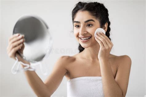 Skincare Routine Smiling Young Indian Woman Cleansing Skin With Cotton