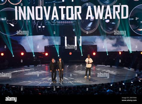 Bono Left And The Edge Of U2 Accept The Innovator Award As Presenter