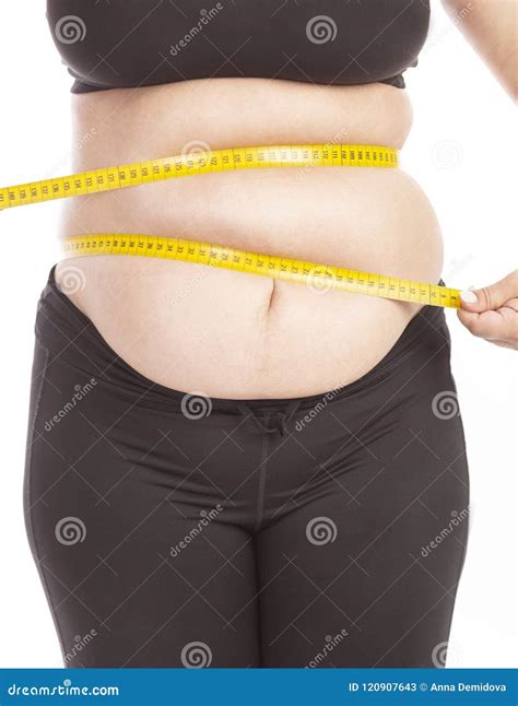 A Fat Woman Grabs Her Belly With Her Hands Close Up Royalty Free Stock