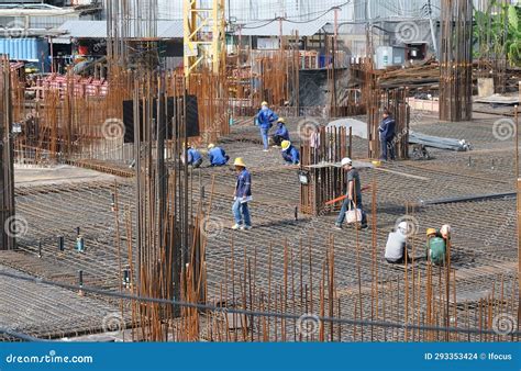 Workers On Top Of Reinforced Concrete Structure Editorial Photo