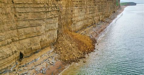 Massive Rockfall At Popular Beach Sparks Emergency Search Amid Fears Of