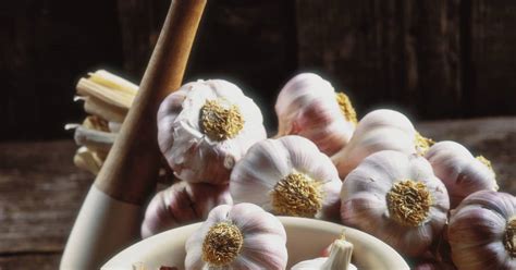 The Olive Oil Hack That Makes Chopping Fresh Garlic Easier