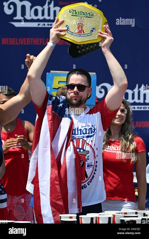 Professional Competitive Eater Patrick Bertoletti Consumes 58 Hot Dogs