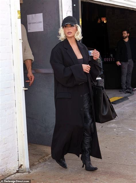 Kim Kardashian Looks Overjoyed To Be Out Of Her Corset As Shes