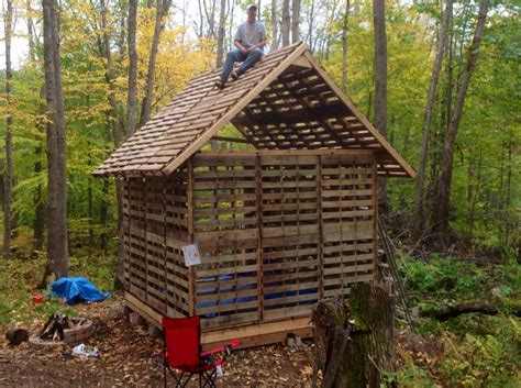 He Built A Tiny Cabin Using Recycled Pallets