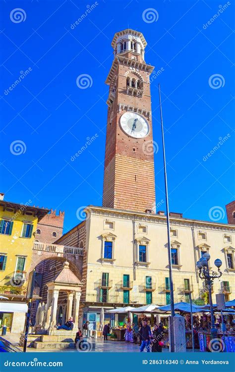 View Of Piazza Delle Erbe Market Stalls And Tower Verona City Italy