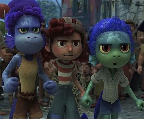 Three Cartoon Characters Standing Next To Each Other In Front Of A Group Of People With Blue Hair