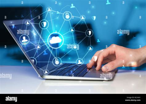 Hand Using Laptop With Centralized Cloud Computing System And Network