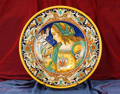 a decorative plate with an image of a woman on it
