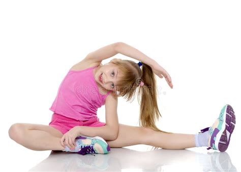 The Gymnast Perform An Acrobatic Element On The Floor Stock Image