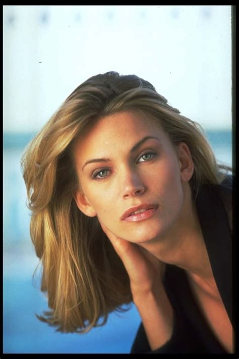 Download Natasha Henstridge In A Captivating Pose Wallpaper