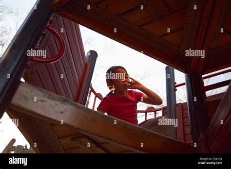 Energetic Cute Young Asian Girl Enjoying Herself Whilst Playing And