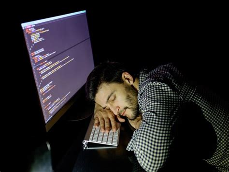 Premium Photo Freelancer Programmer Falling His Face Down Taking A Nap