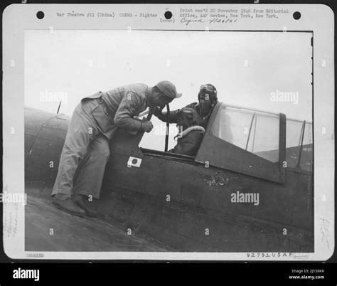 Colonel Eugene L Strickland Makes His Final Check With Pilot Lt T Y